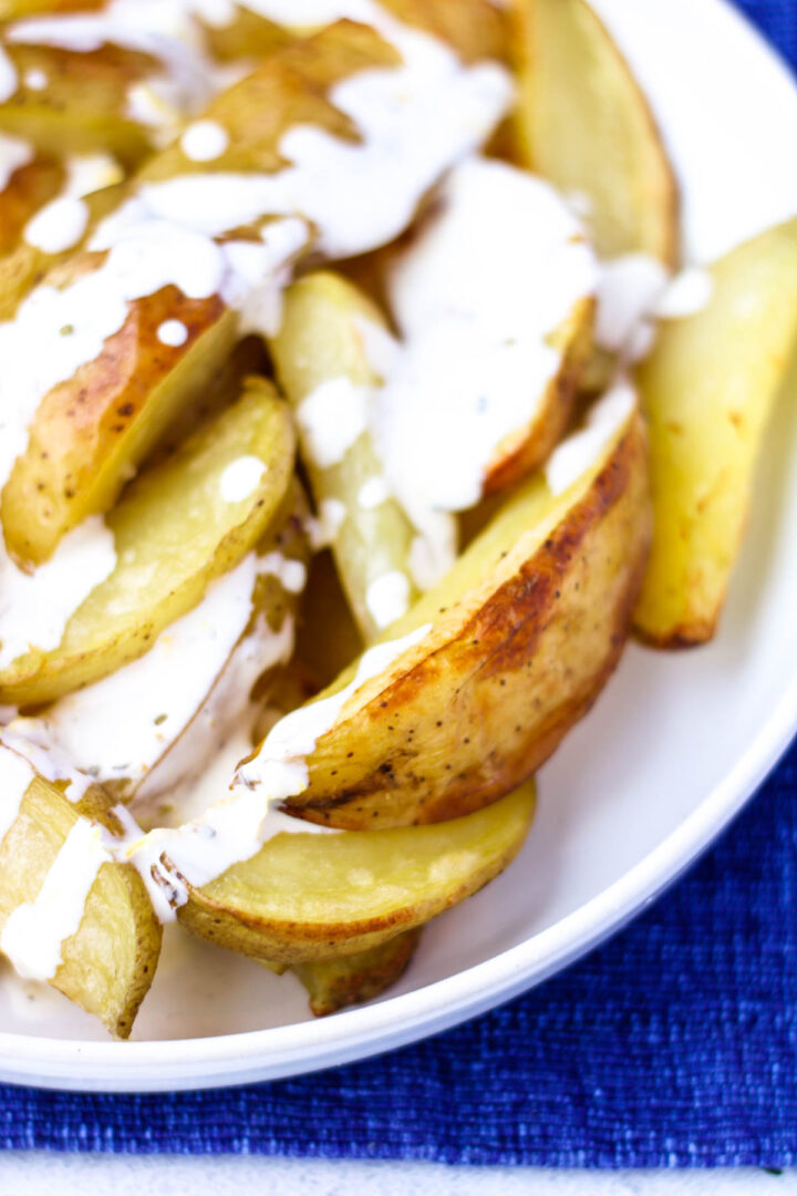 Oven Roasted Yellow Potatoes with Lemon Greek Yogurt Sauce - Eats by April
